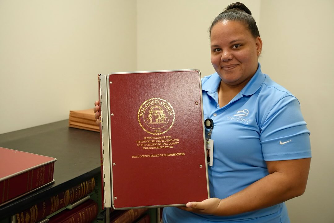 Hall minutes book, circa 1800s, restored thanks to county employee
